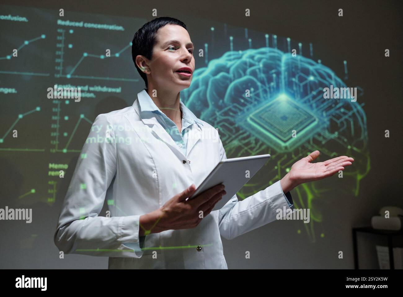 Scientist Giving Presentation on Brain Implants Stock Photo - Alamy