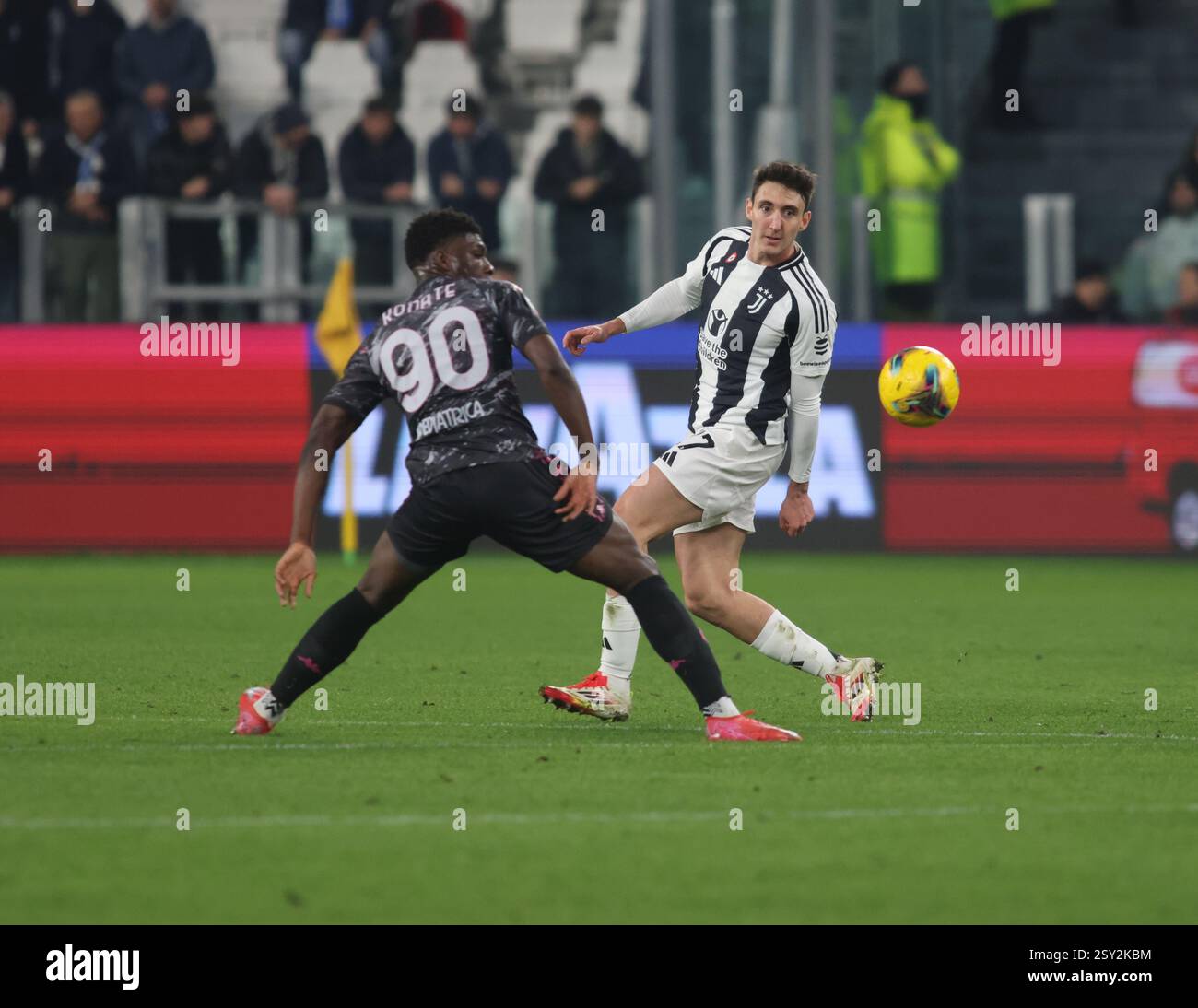 Turin, Italy. 26th Feb, 2025. Andrea Cambiaso of Juventus FC and Ismael Konate of Empoli FC ...