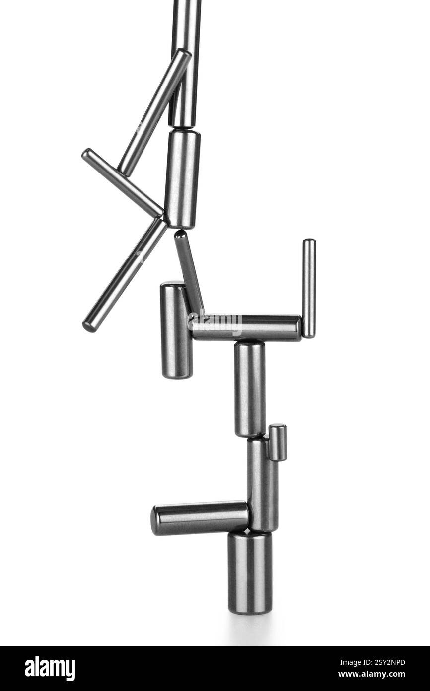 Balancing of needle, roller bearing pin, india, asia Stock Photo - Alamy