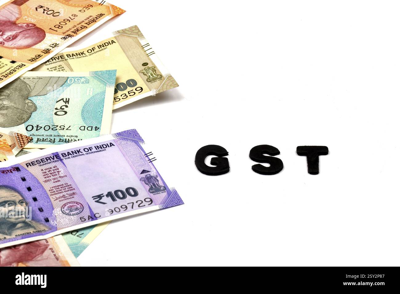GST concept, GST alphabet on money background, business and financial ...