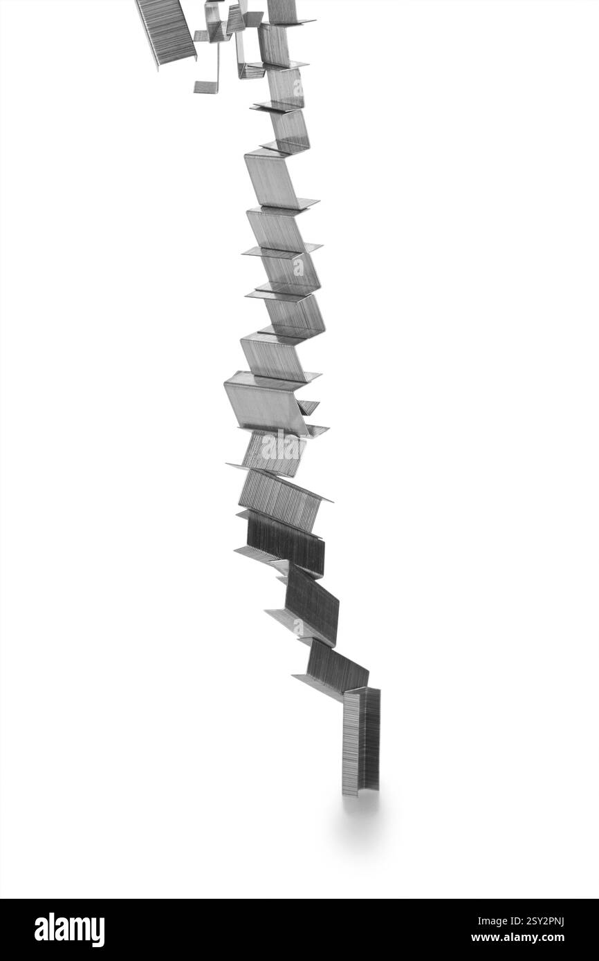 Balancing of stapler pin, india, asia Stock Photo - Alamy