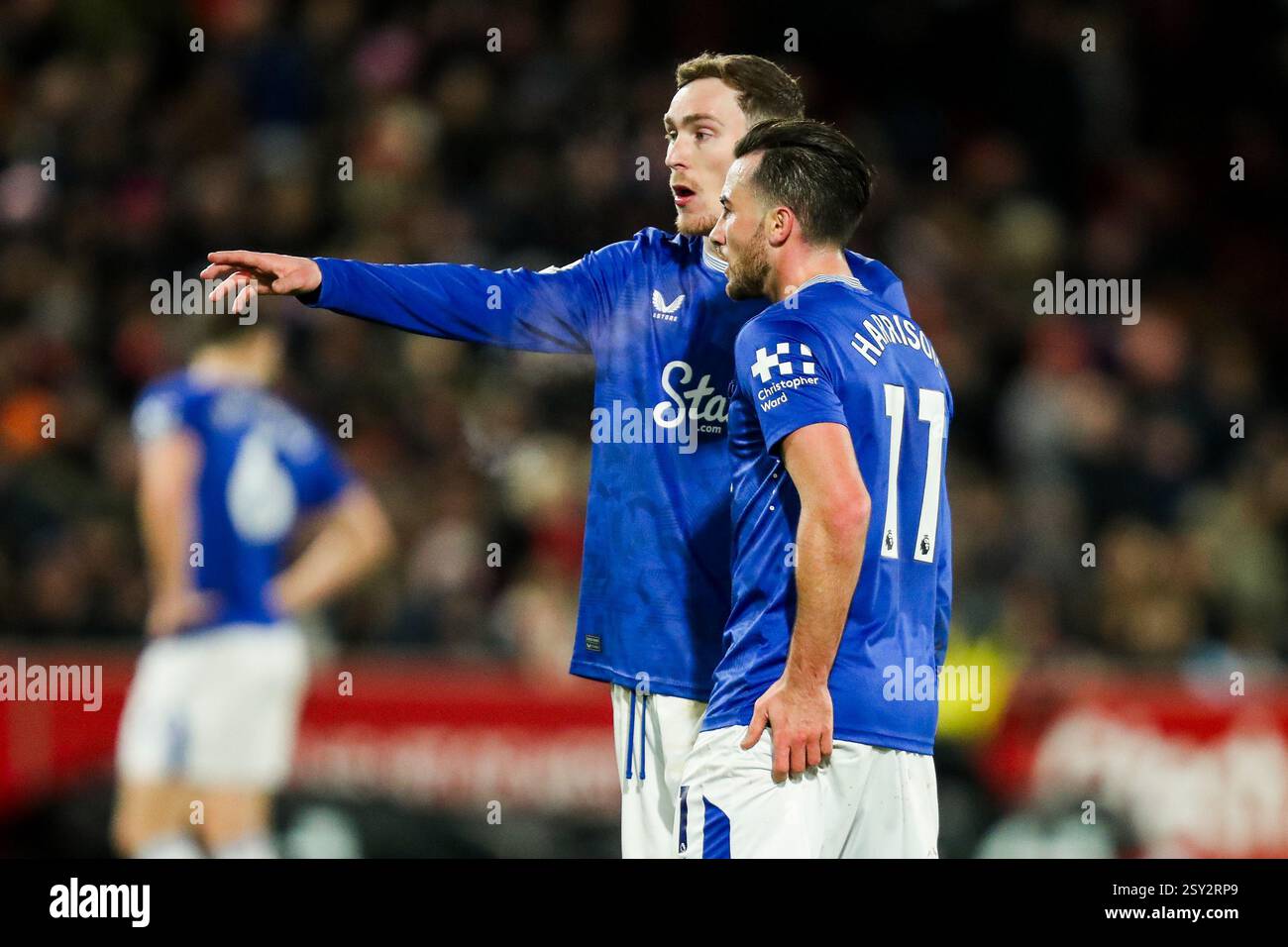 London, UK. 26th Feb, 2025. James Garner of Everton speaks to Jack ...