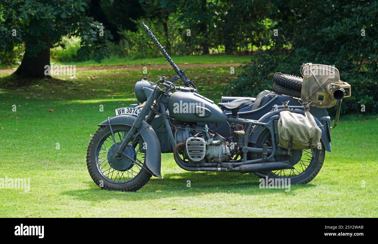 Vintage German WW2 motorcycle and sidecar isolated on grass Stock Photo ...