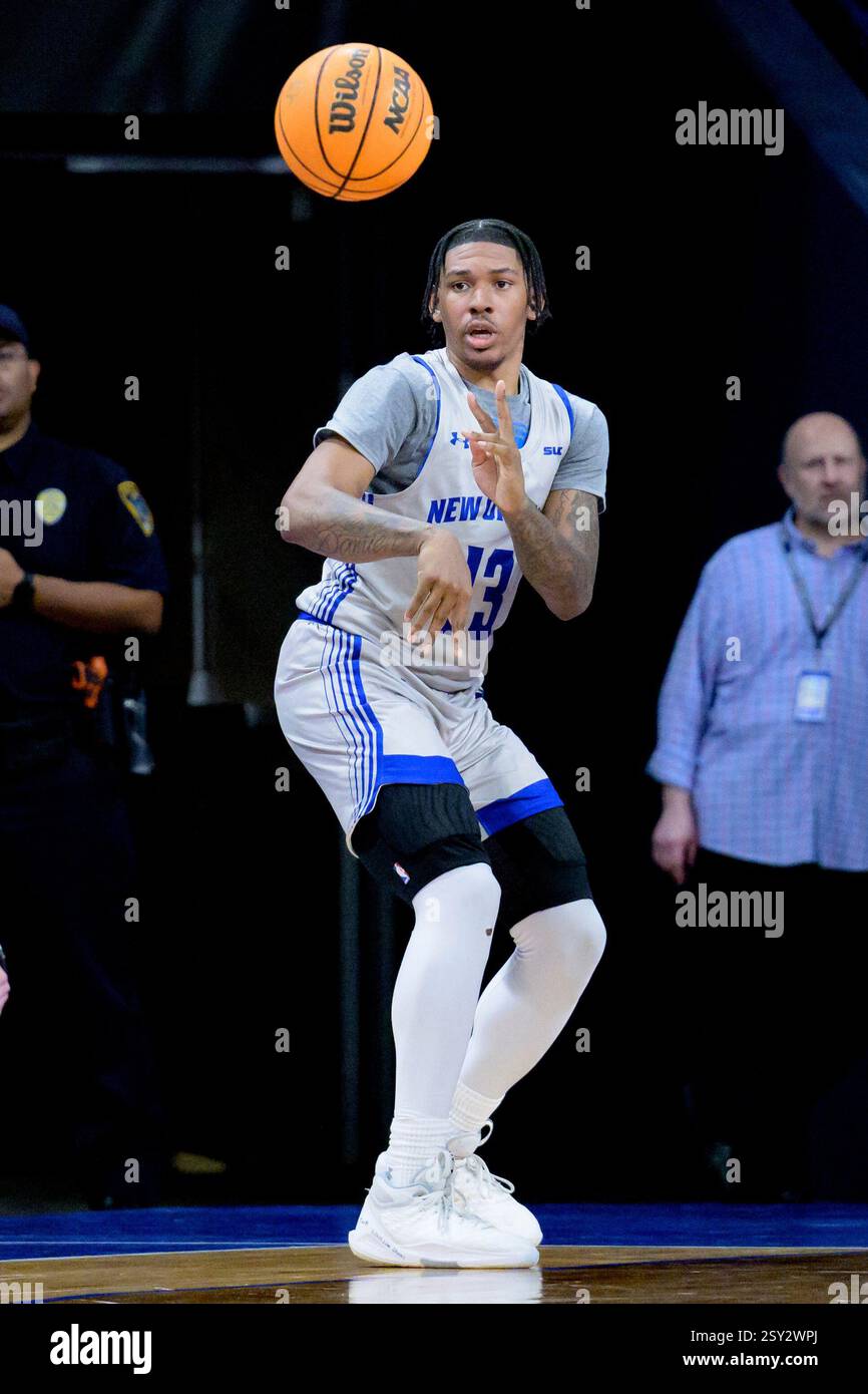 New Orleans guard Jamond Vincent (13) passes during an NCAA college ...