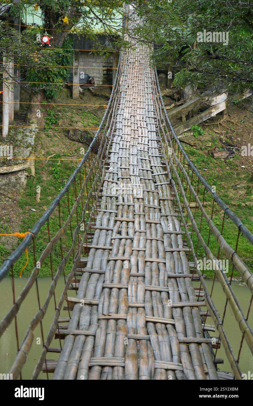 Bamboo suspension bridge over a river for pedestrians Bohol ...