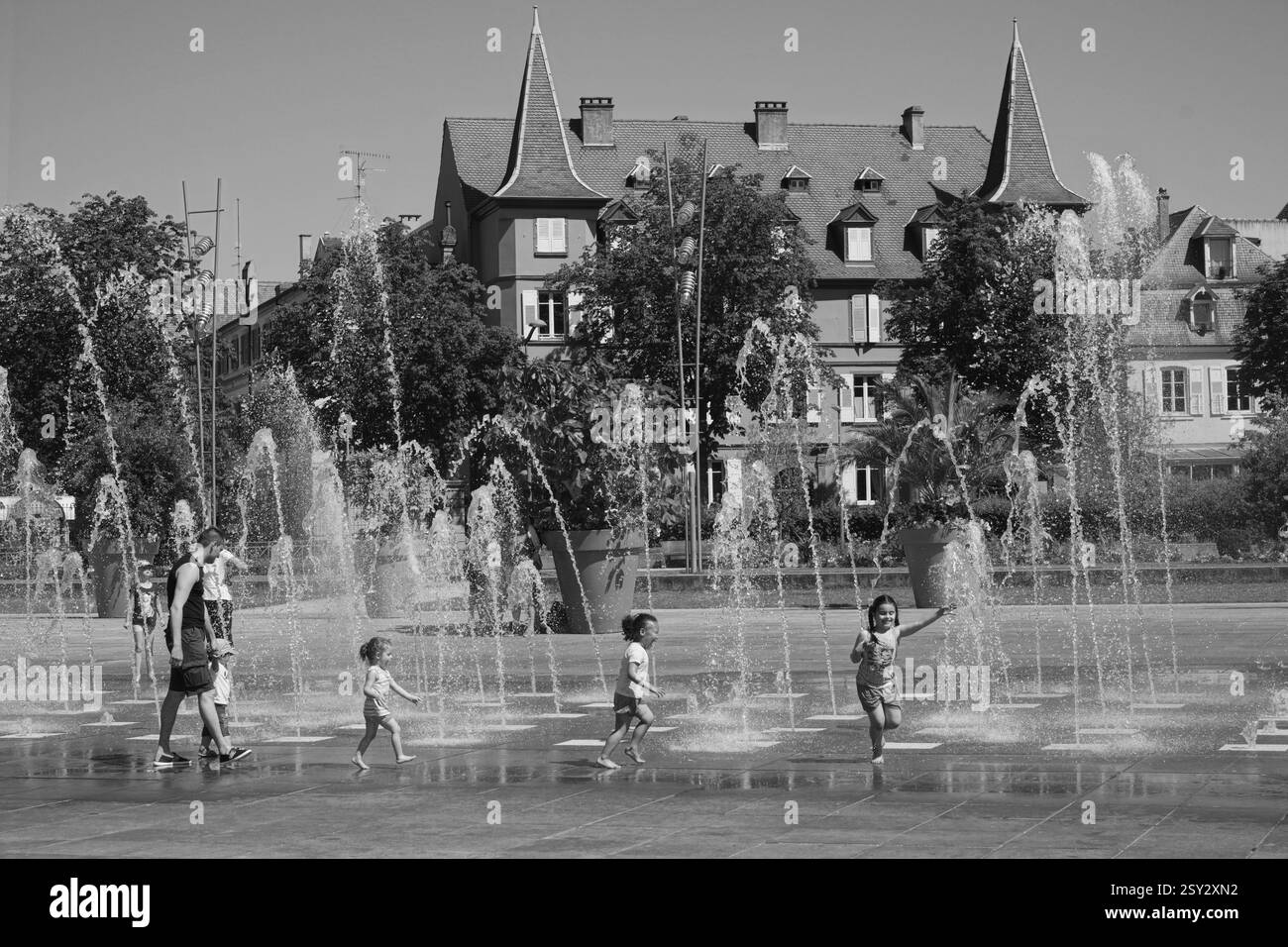 Children playing water fountain near paris, france, europe Stock Photo ...