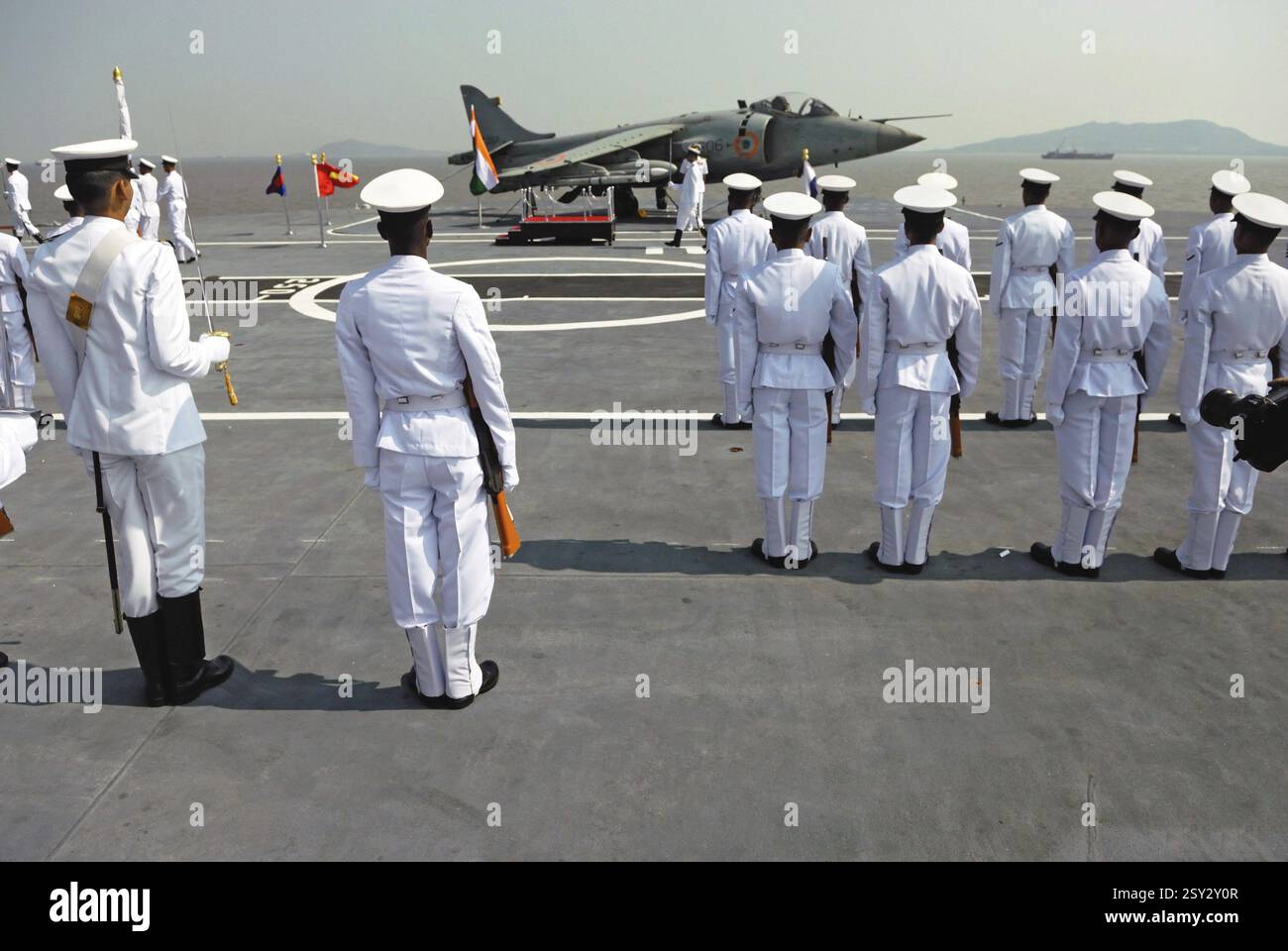 Indian navy sailors ready for guard of honour on the deck of aircraft ...