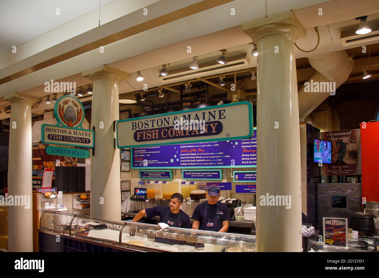 Inside the Quincy Market istorical building with its restaurants and ...