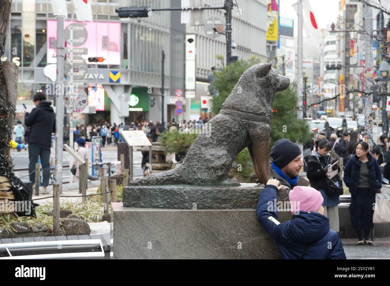 Statue of the faithful dog Hachiko who waited for its owner outside ...