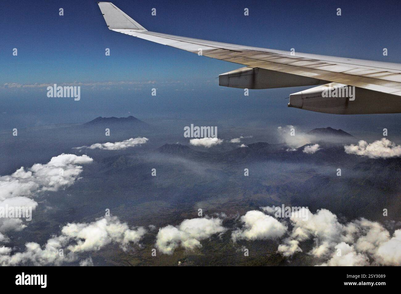 Aerial view, wing with winglet and volcanoes on the Malay Peninsula ...
