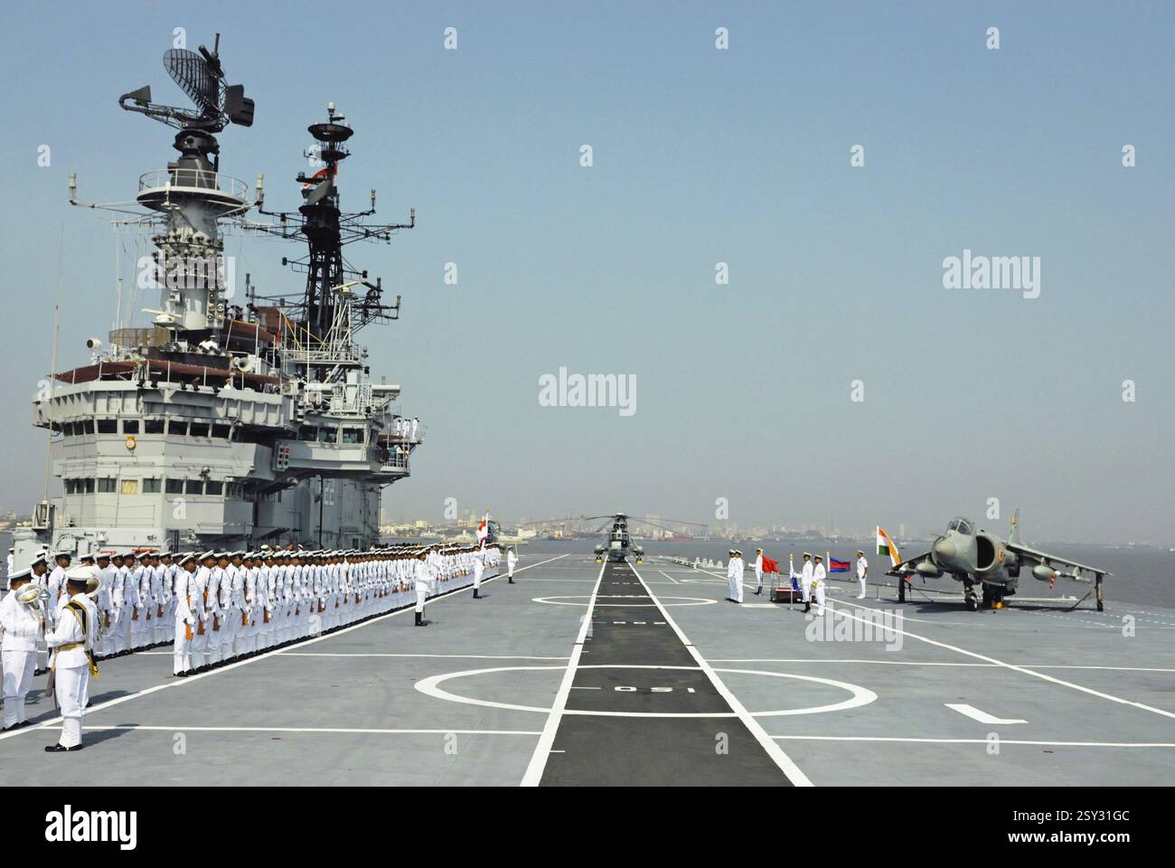 Indian navy sailors ready for guard of honour on the deck of aircraft ...