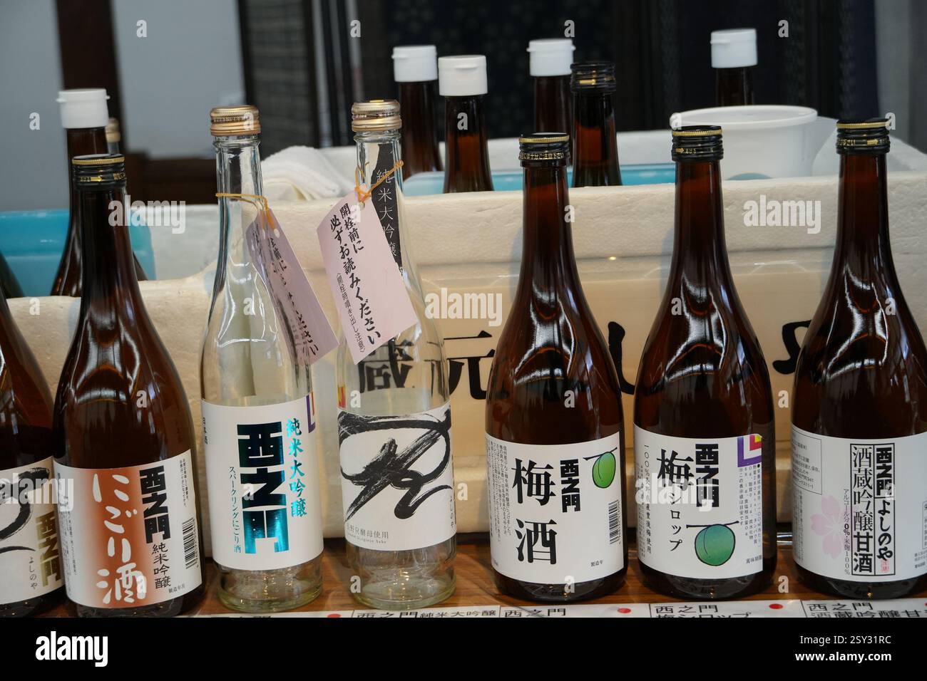 Bottles of Japanese sake Stock Photo - Alamy