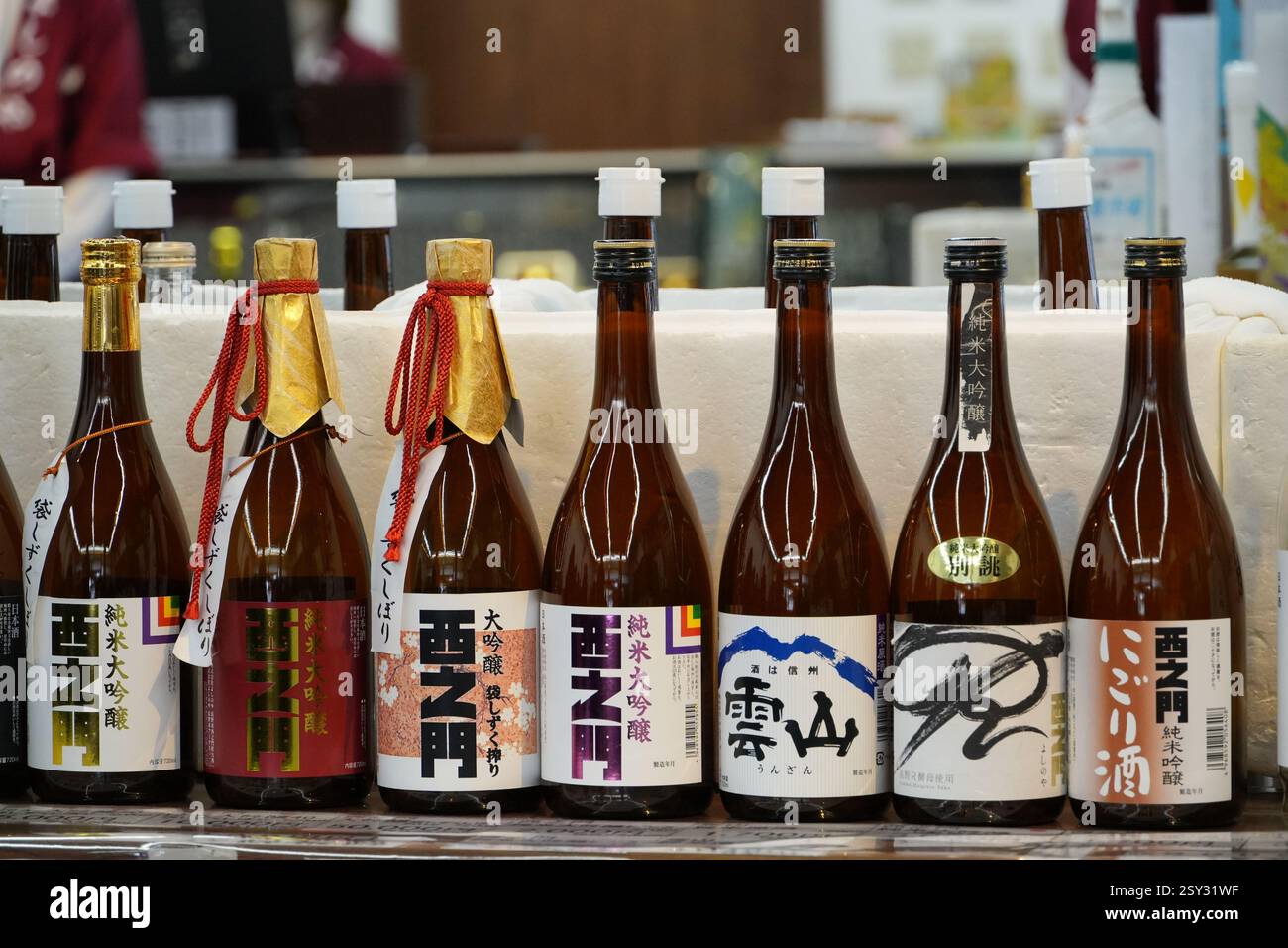 Bottles of Japanese sake Stock Photo - Alamy