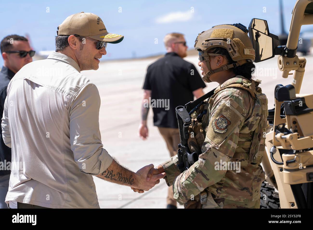 Secretary of Defense Pete Hegseth meets a U.S. service member during ...