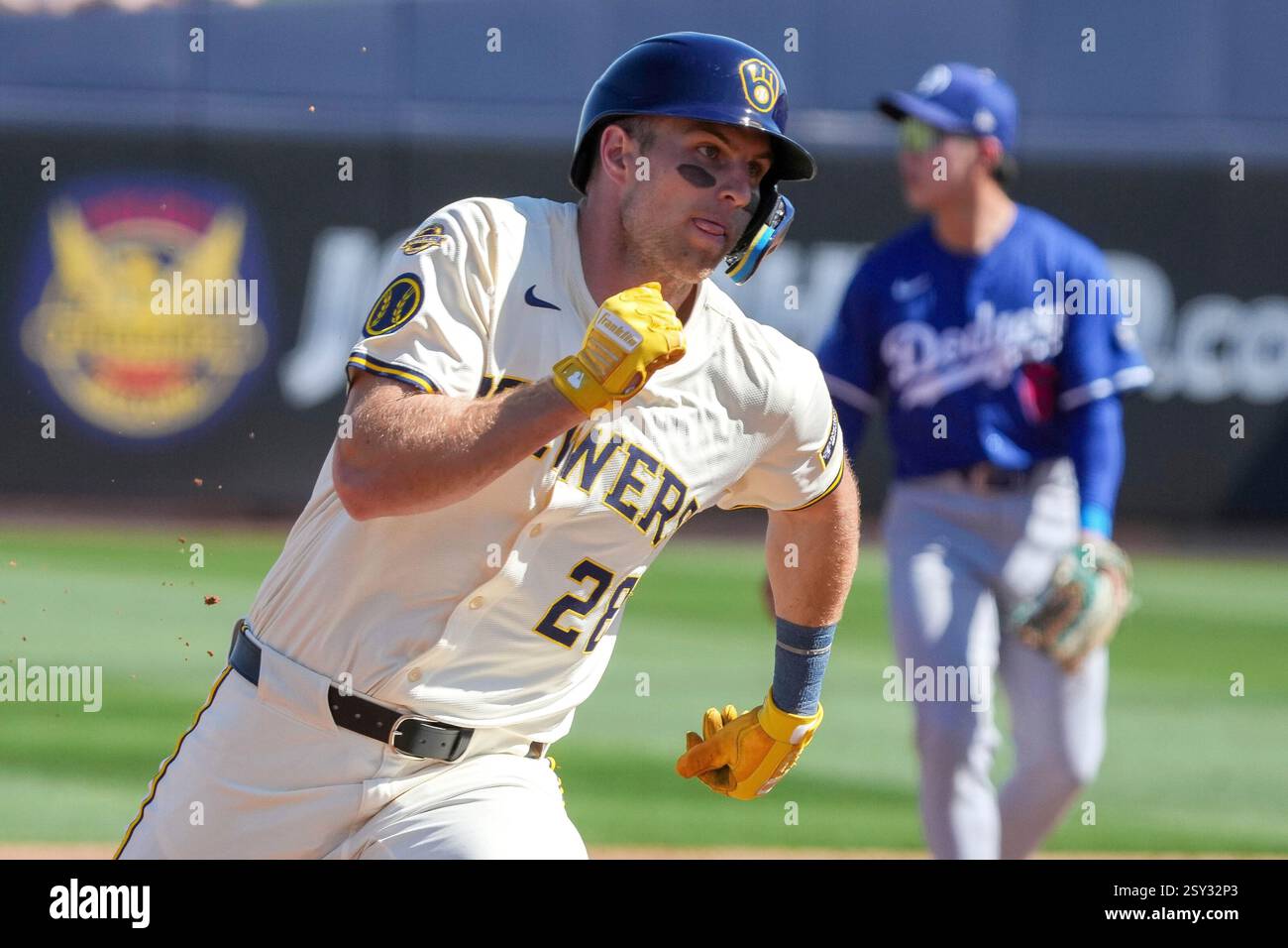 Milwaukee Brewers' Brewer Hicklen (28) rounds third base during the ...