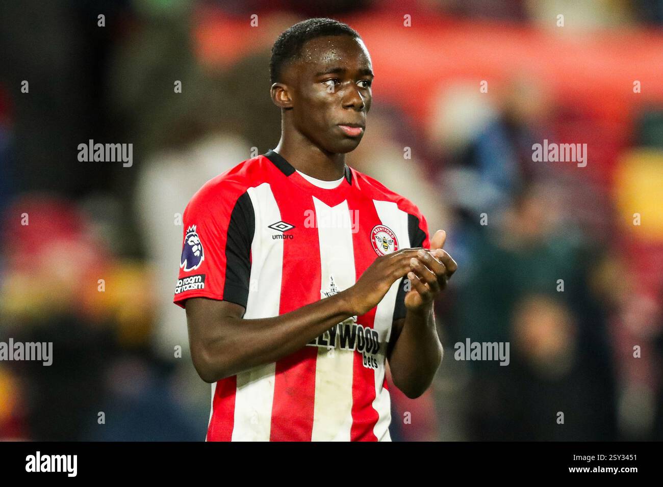 London, UK. 26th Feb, 2025. Michael Kayode of Brentford acknowledges the fans after the teams ...