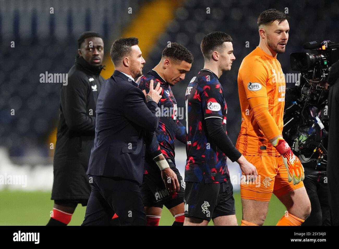 Rangers interim head coach Barry Ferguson (second left) and James ...
