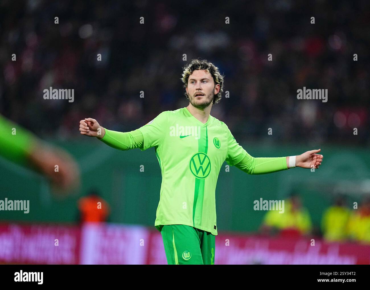 Red Bull Arena, Leipzig, Germany. 26th Feb, 2025. Jonas Wind of VfL Wolfsburg gestures during a ...
