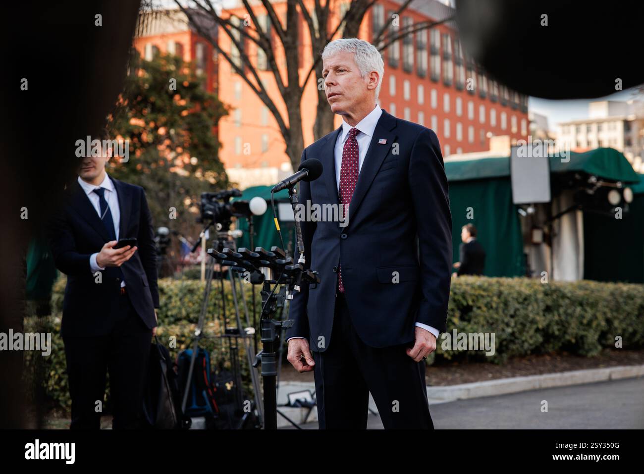 Energy Secretary Chris Wright speaks to reporters outside of the West ...