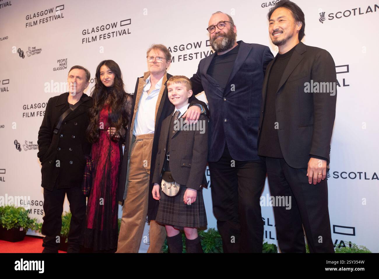 Glasgow, UK. 26th Feb, 2025. Tim Roth, Kōki, John Maclean, Nathan ...