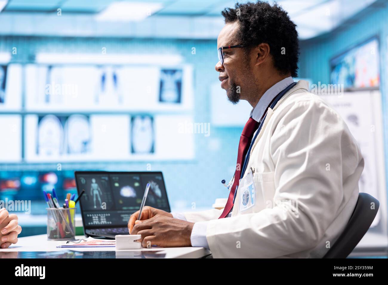Doctor and patient discussing diagnostic results in a modern medical ...