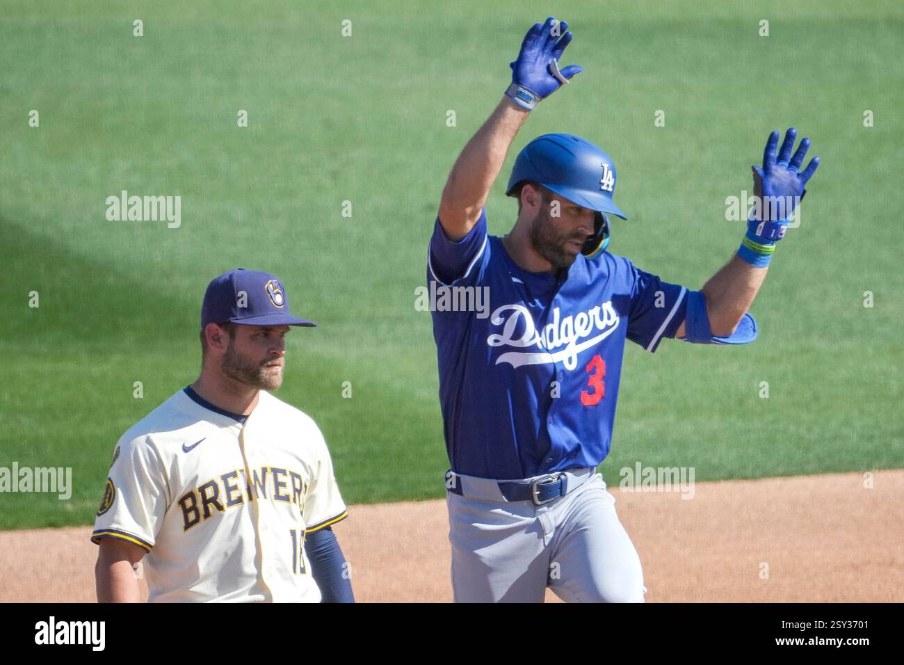 Los Angeles Dodgers Chris Taylor (3) celebrates behind Milwaukee ...