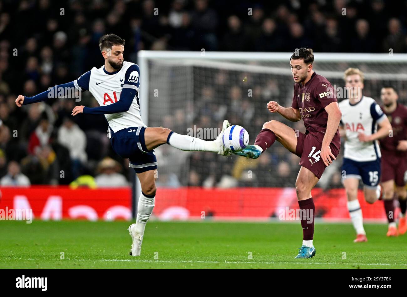 London, UK. 26th Feb, 2025. Rodrigo Bentancur (Spurs) and Nico Gonzalez ...