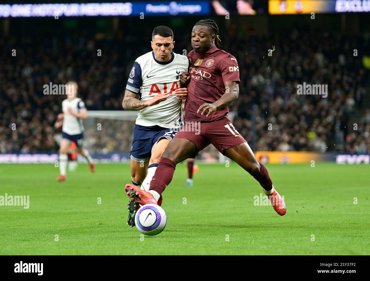 London UK 26th February 2025. Jeremy Doku (Manchester City) and Pedro ...