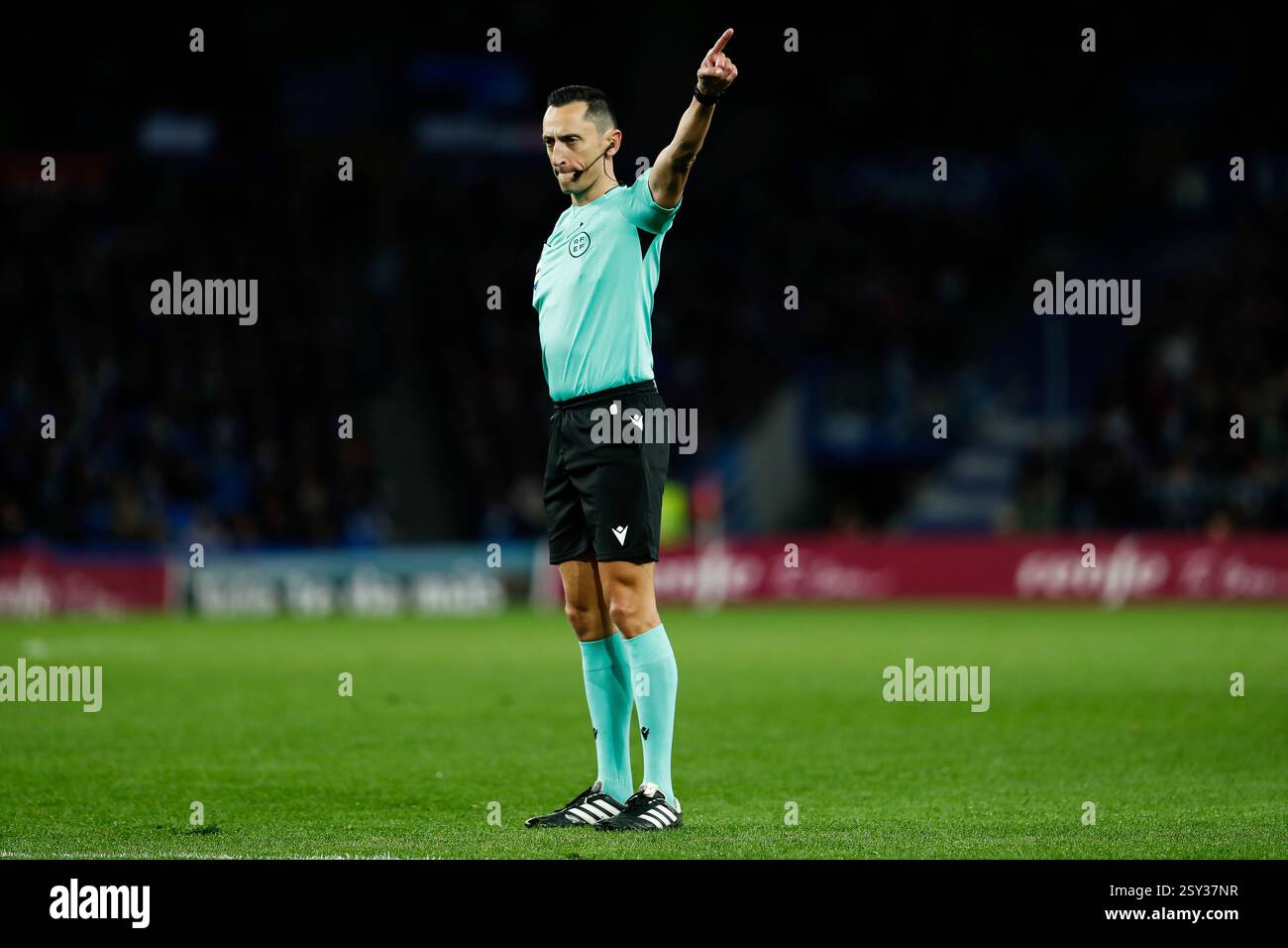 Jose Maria Sanchez Martinez, referee of the match, gestures during the ...