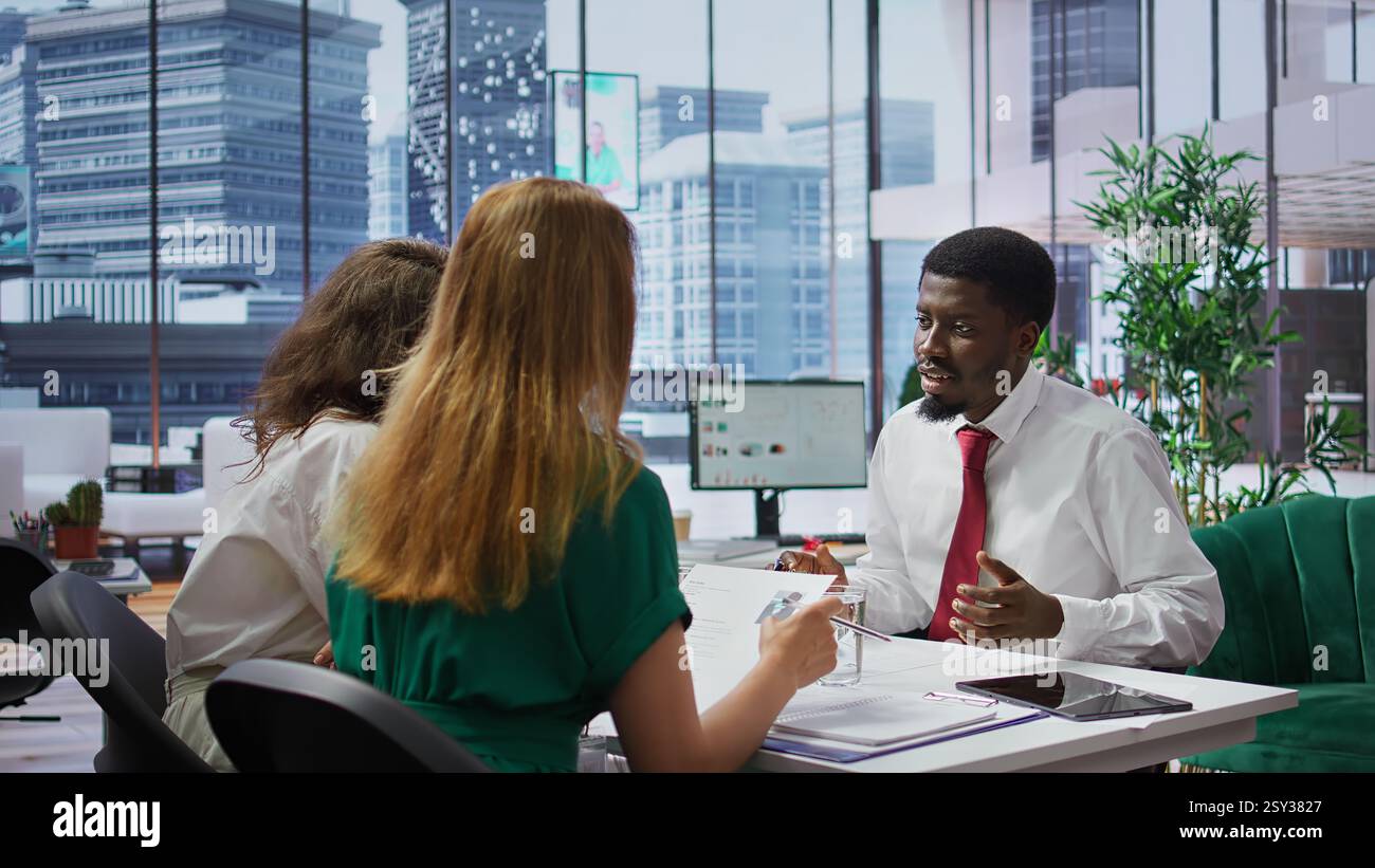 Businessman attending job interview with the HR employees in office ...