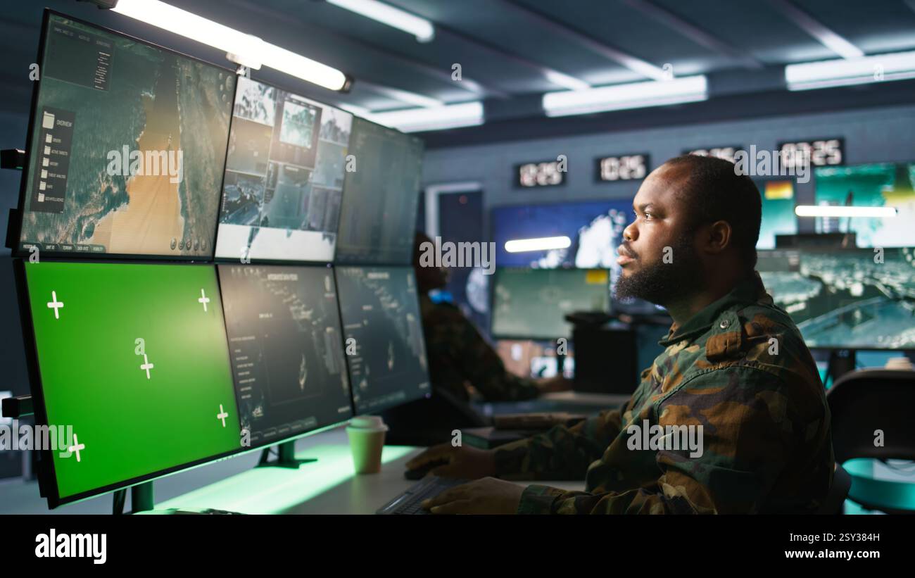 Air force officer performing tactical level surveillance in command ...