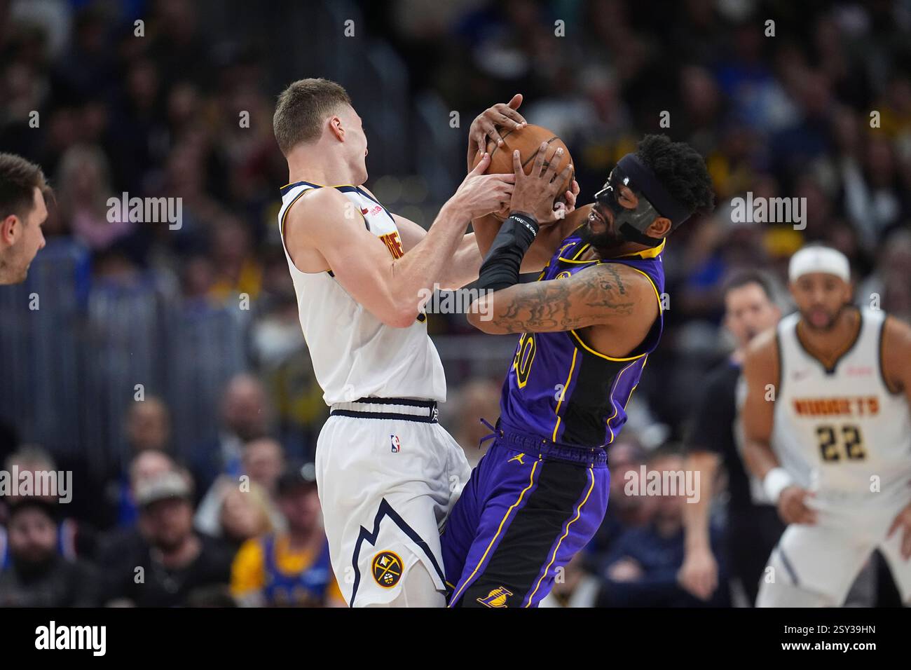 Los Angeles Lakers guard Jordan Goodwin (30) and Denver Nuggets guard ...