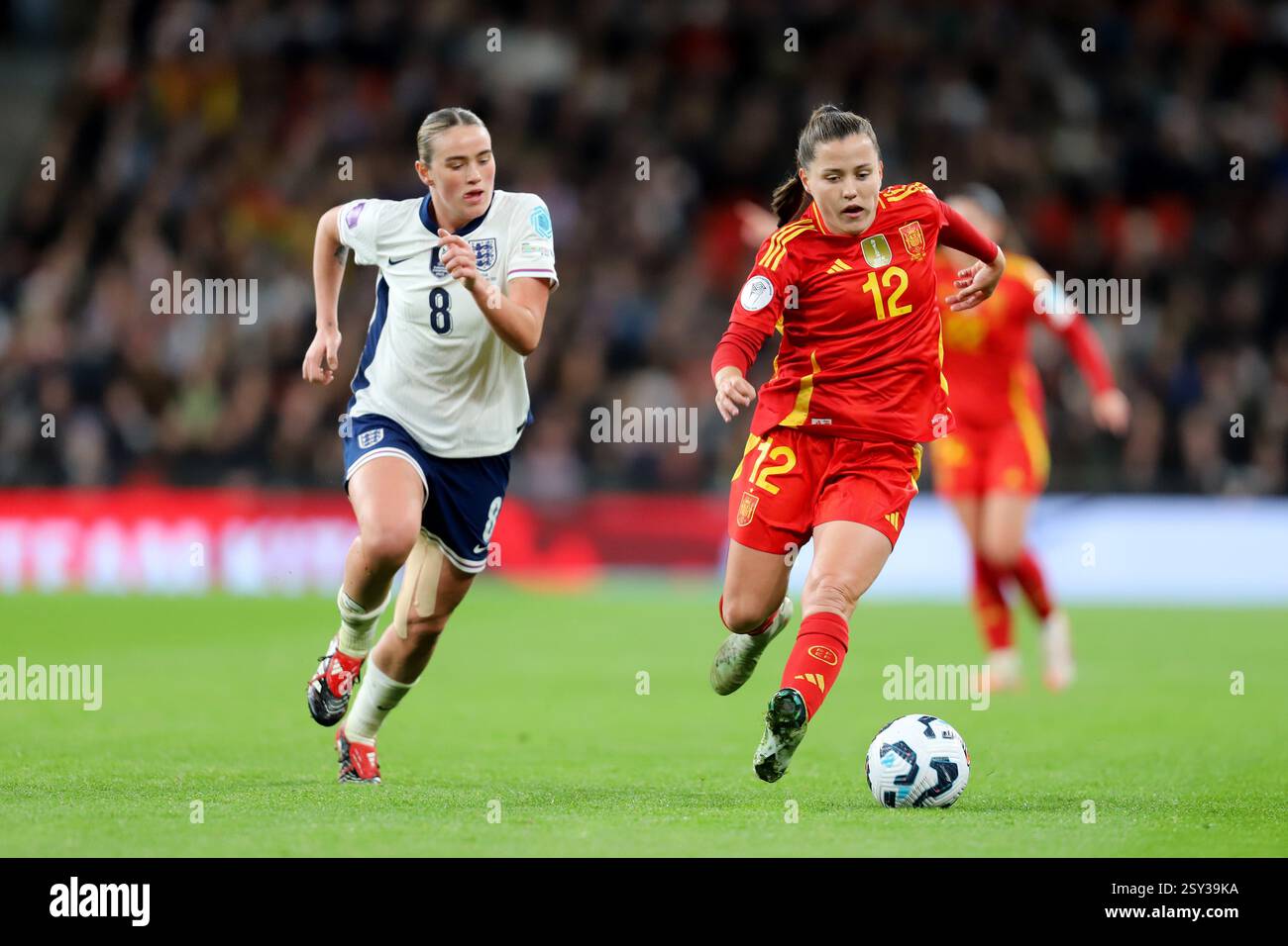 Spain's Clàudia Pina in action with England Women's Ella Toone during ...