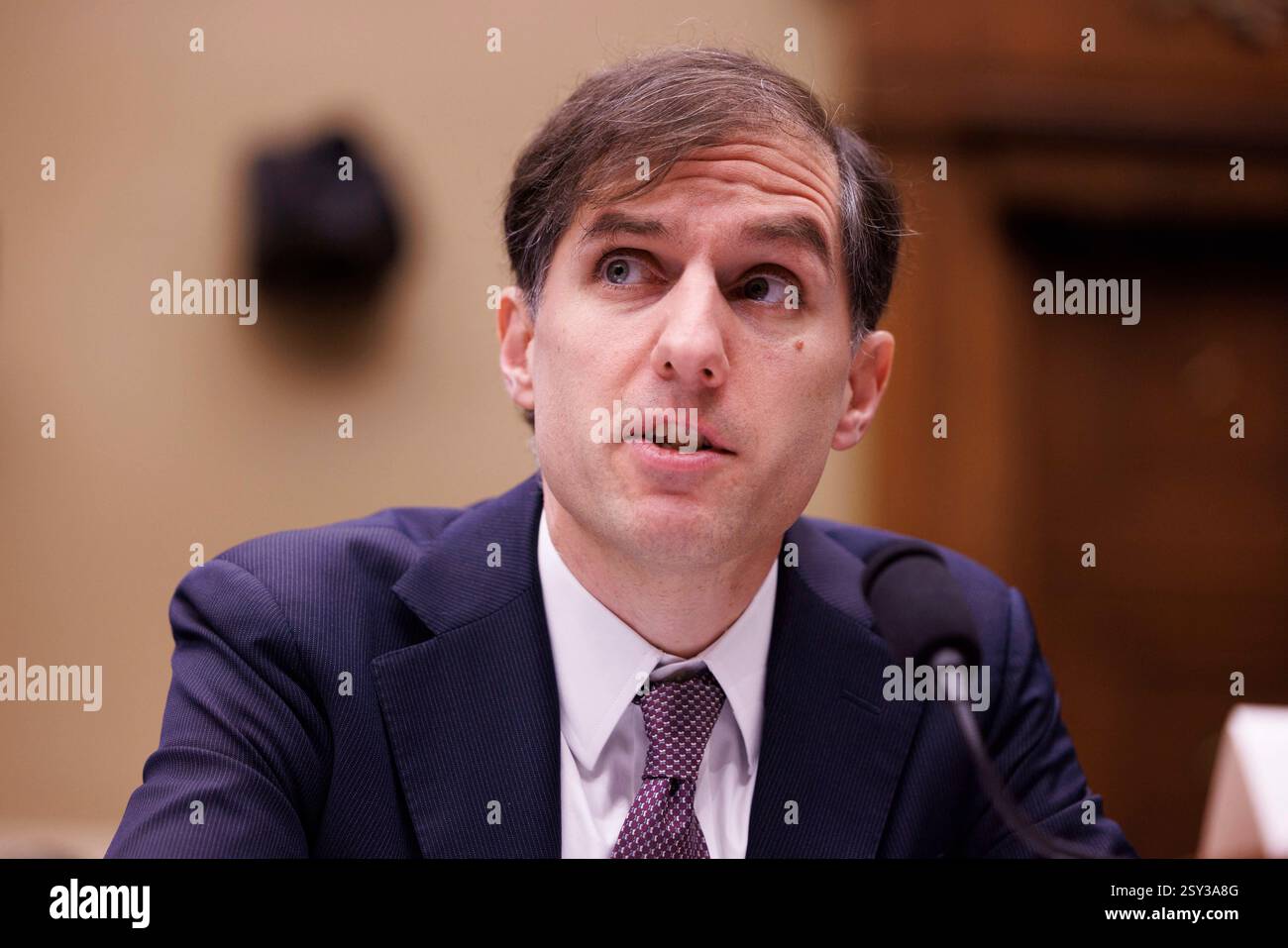 Washington, United States. 26th Feb, 2025. Dr. Matthew Fiedler gives ...