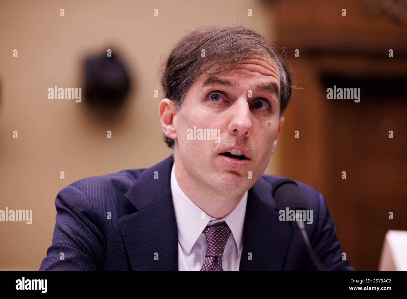 Washington, United States. 26th Feb, 2025. Dr. Matthew Fiedler gives ...