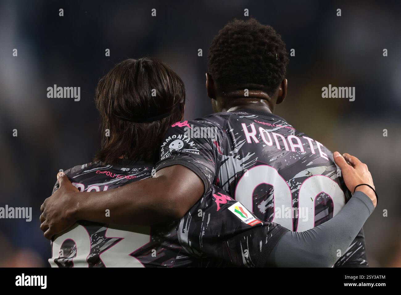 Turin, Italy. 26th Feb, 2025. Youssef Maleh of Empoli FC embraces team ...