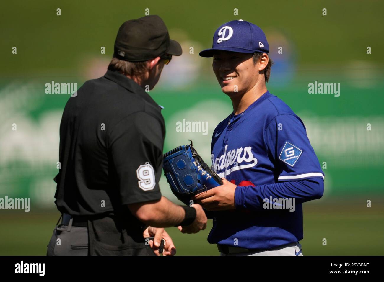 Los Angeles Dodgers starting pitcher Yoshinobu Yamamoto (18) is ...