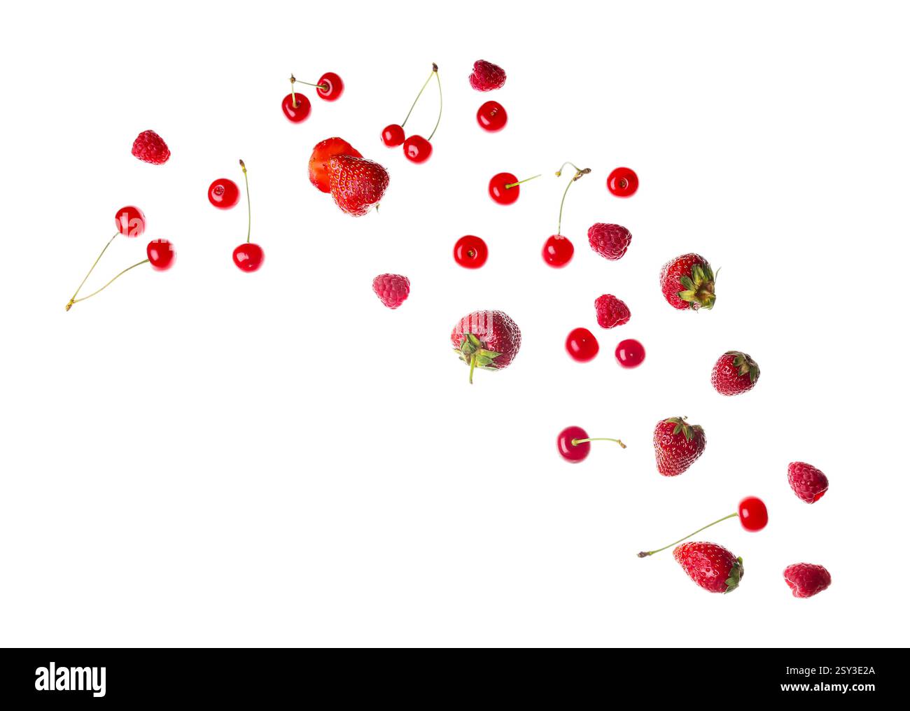 Flying fresh strawberries with raspberries and red cherries on white ...