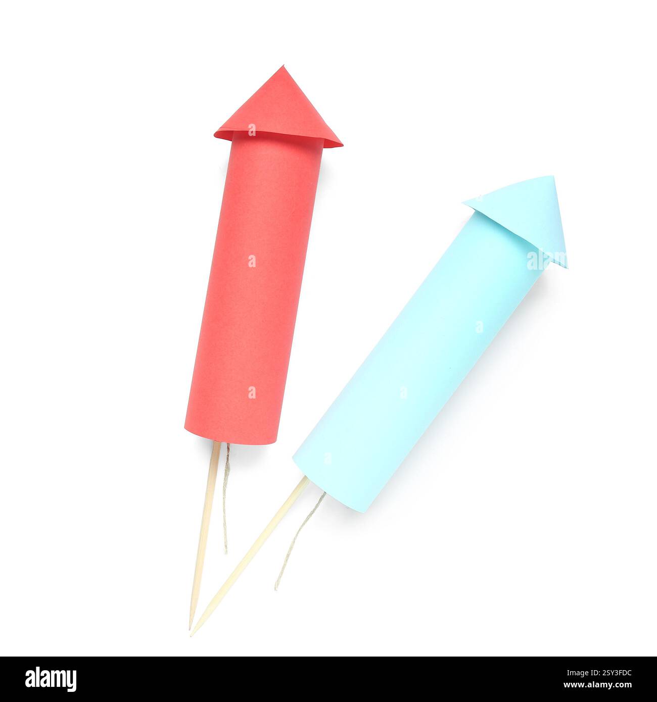 Blue and red firework rockets on white background Stock Photo - Alamy