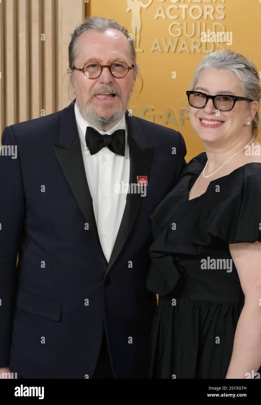 LOS ANGELES, CALIFORNIA - FEBRUARY 23: (L-R) Gary Oldman and Gisele Schmidt attend the 31st ...
