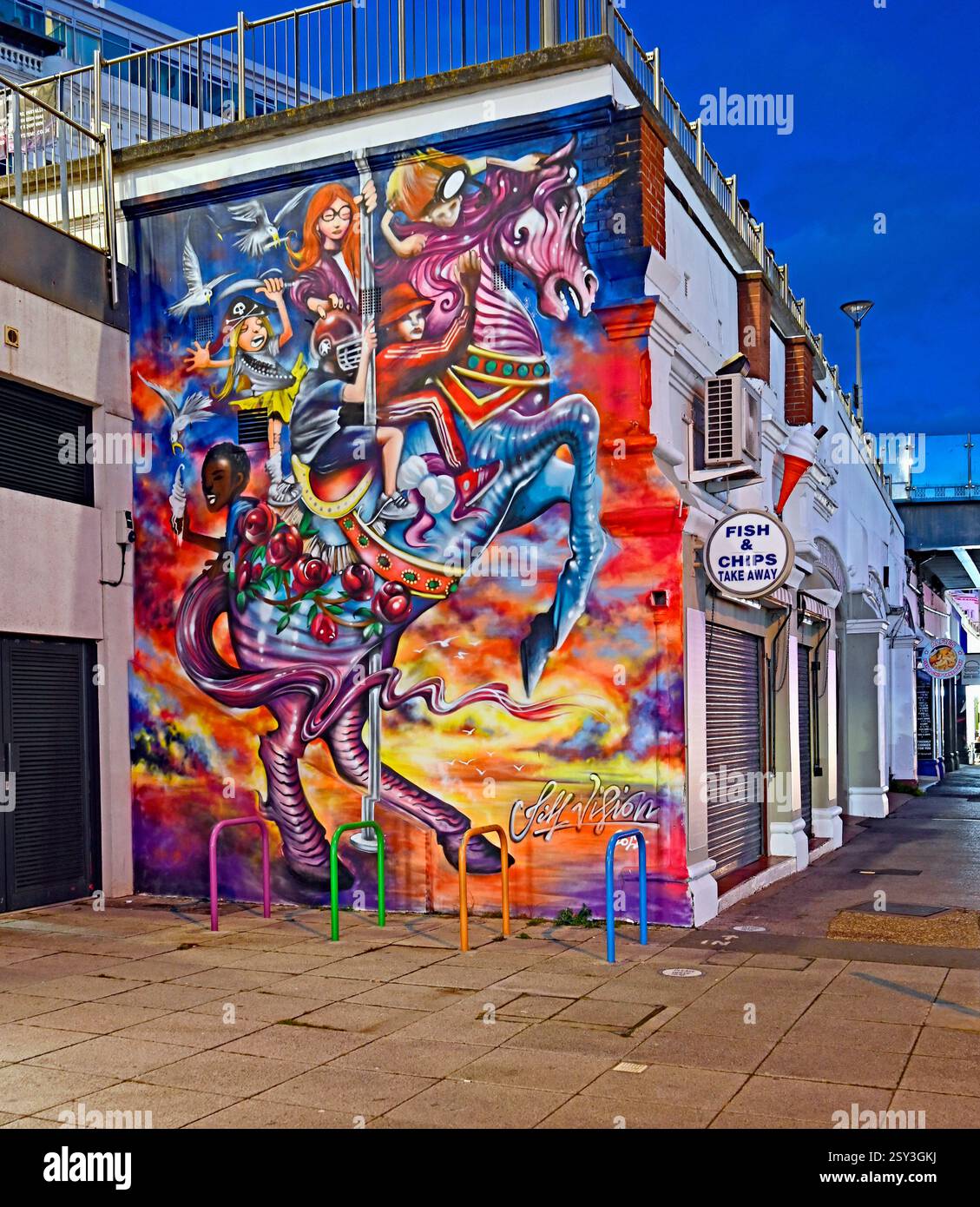 A mural on the Western Esplanade between the pier and twin cliff lift ...