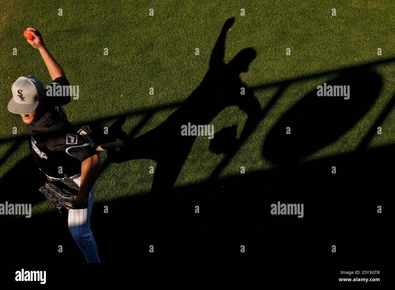 Chicago White Sox pitcher Eric Adler warms up during the seventh inning ...