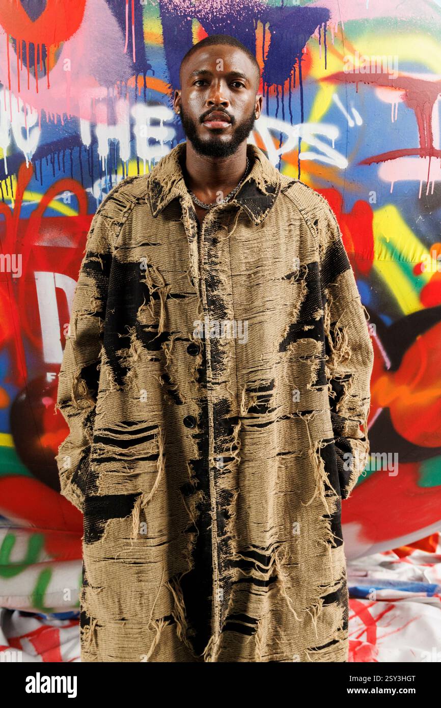 Daliwonga attends DIESEL Autumn-Winter 2025 runway during Milan Fashion ...