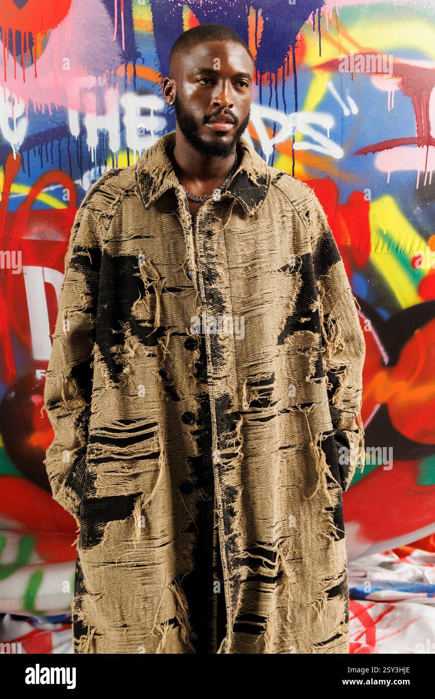 Daliwonga attends DIESEL Autumn-Winter 2025 runway during Milan Fashion ...