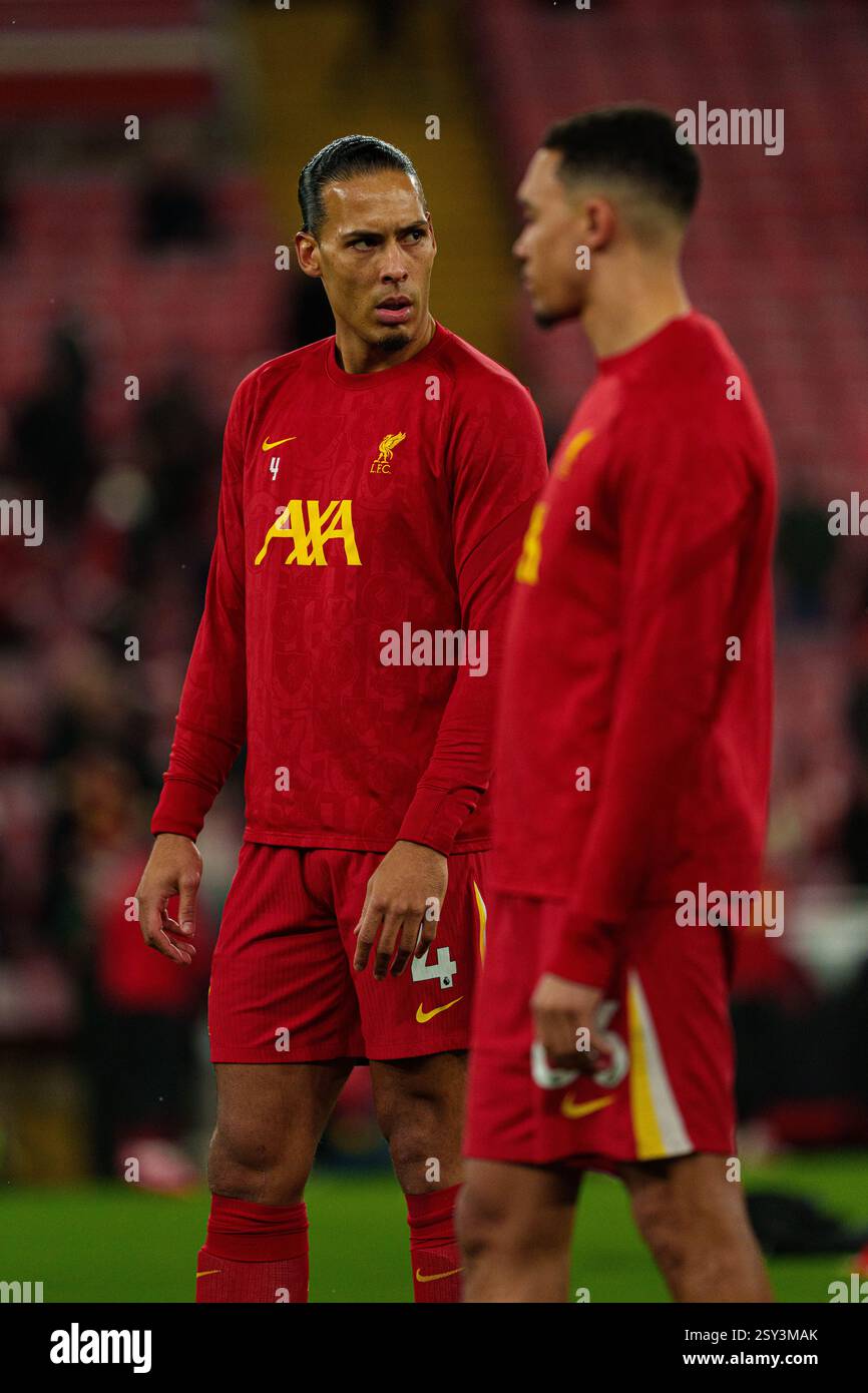 Liverpool's Virgil van Dijk warms up with Trent Alexander-Arnold during ...