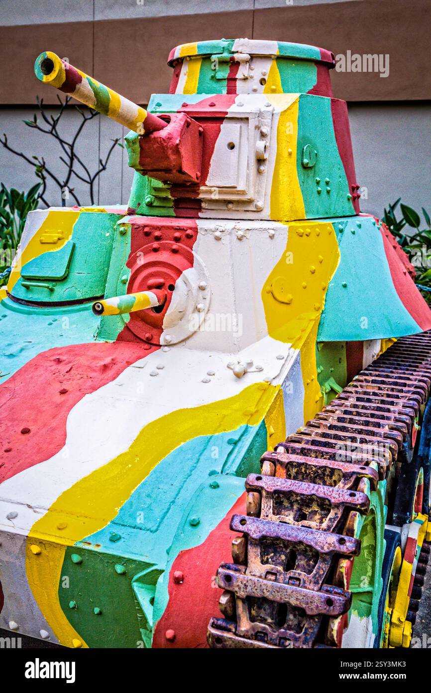 Colorful tank with a red stripe on the side. The tank is painted in a ...