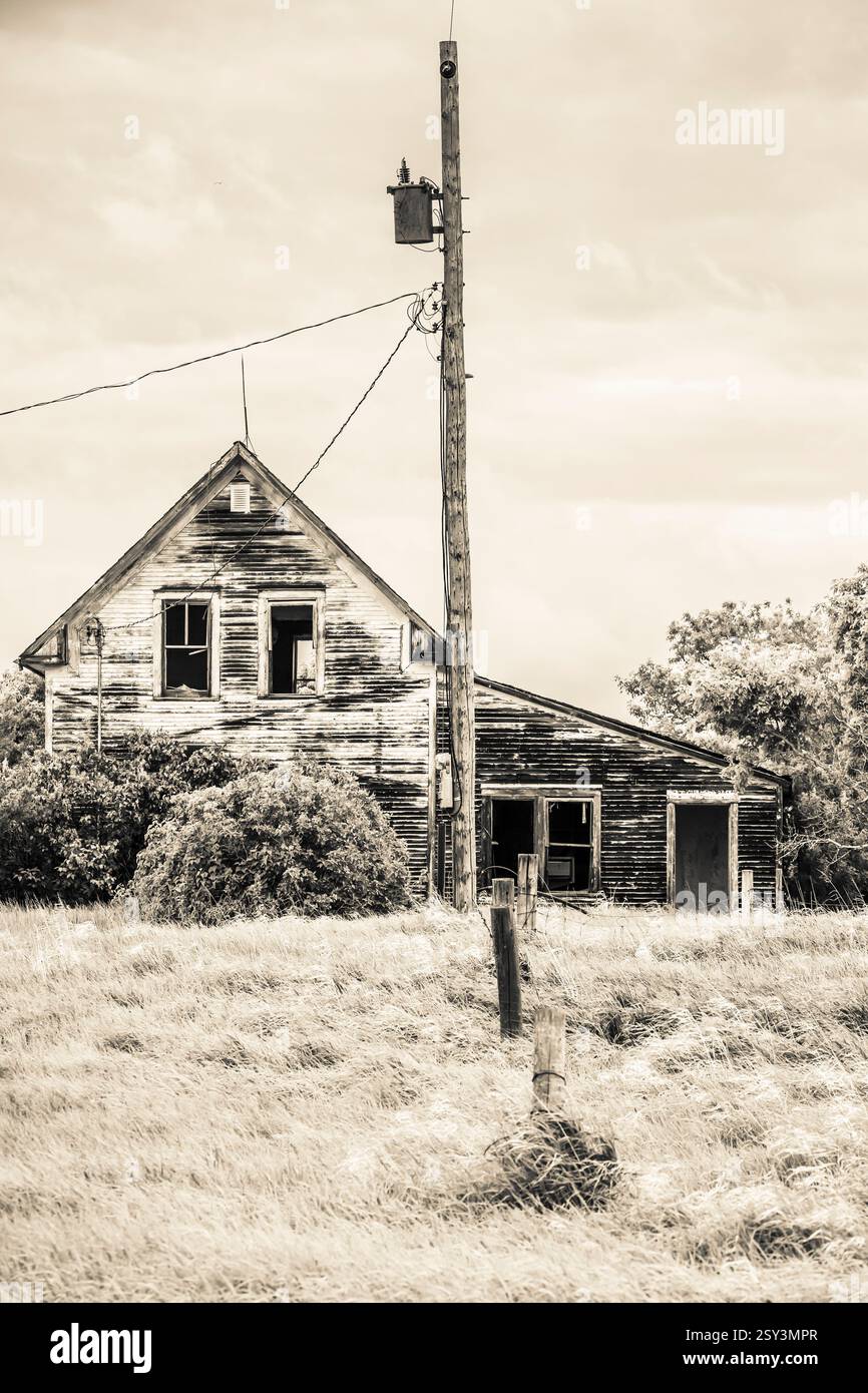 House with a pole in front of it. The house is old and has a lot of ...