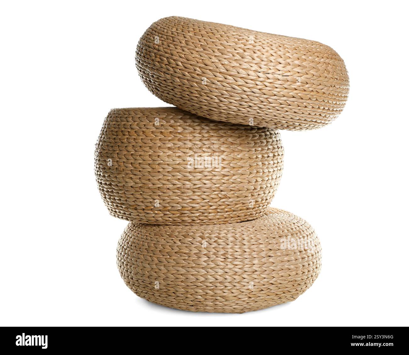 Three stylish wicker poufs on white background Stock Photo - Alamy