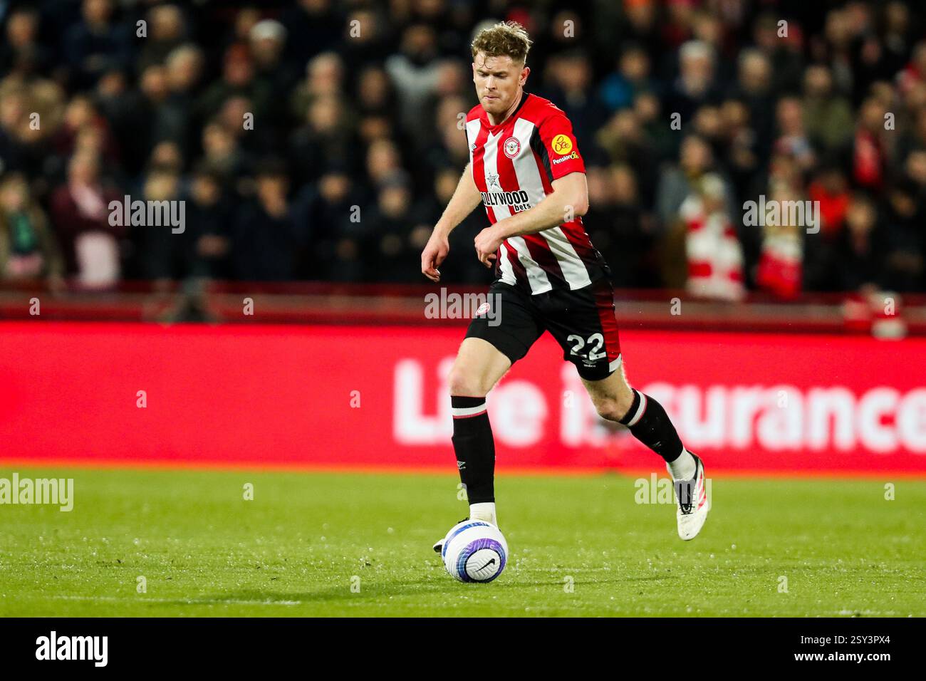 Nathan Collins of Brentford runs with the ball during the Premier ...