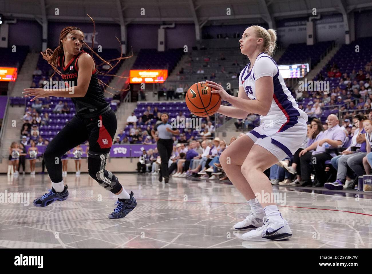 TCU guard Hailey Van Lith, right, pulls up to shoot as Houston's Gigi ...